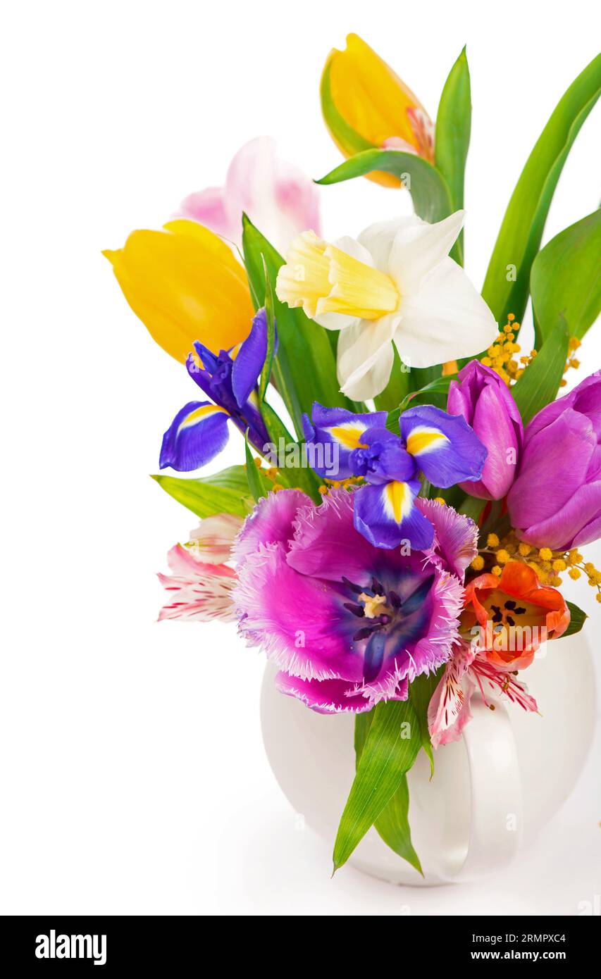 Bright spring bouquet in a white vase. spring flowers, daffodils ...