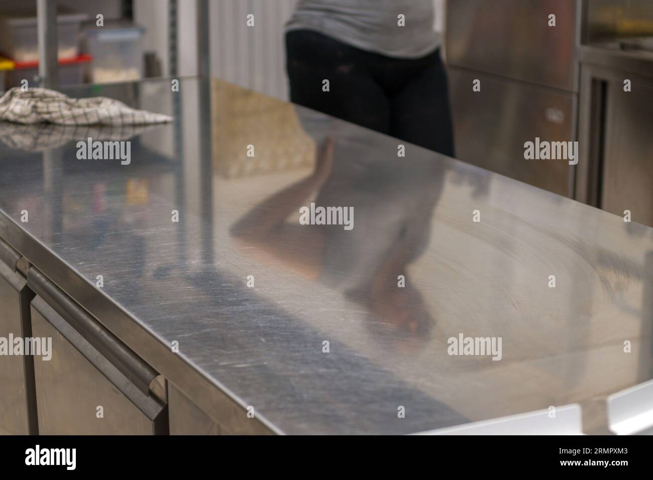 clean stainless steel counter in professional kitchen - hygiene concept ...