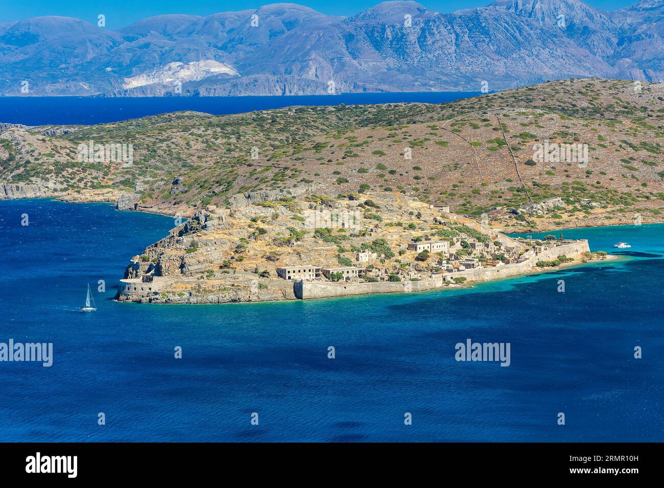 The ruined Venetian fortress and former leper colony of Spinalonga near ...