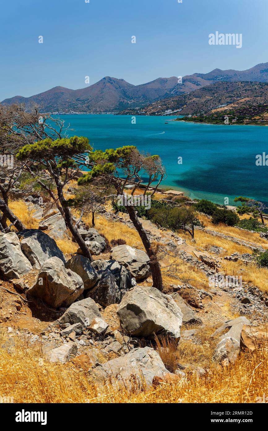 The ruins of an ancient Venetian fortress overlooking crystal clear ...