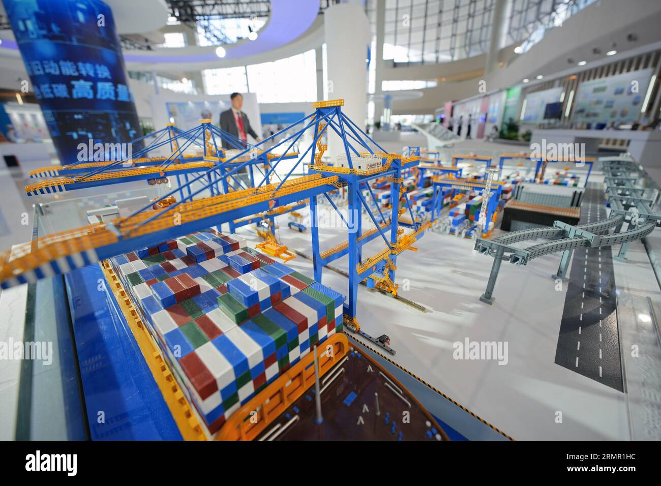YANTAI, CHINA - AUGUST 29, 2023 - Visitors look at a fully automated ...