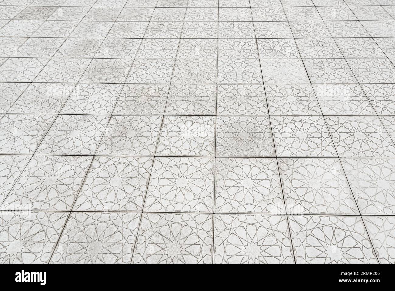The texture of a monotonous tiled pavement with perspective. Abstract ...