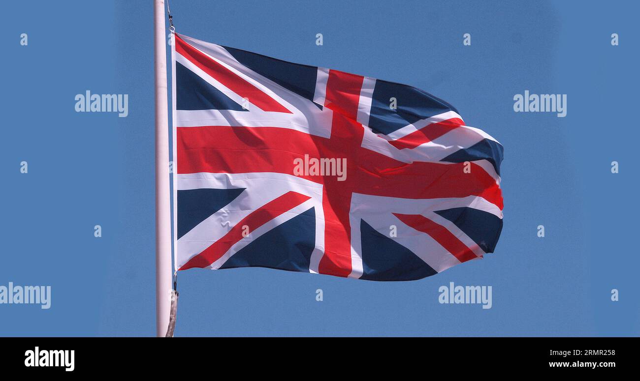 English Flag Waving in the Wind Stock Photo - Alamy