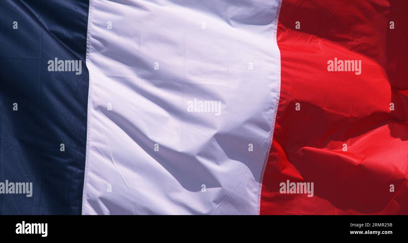 French Flag Waving in the Wind Stock Photo - Alamy