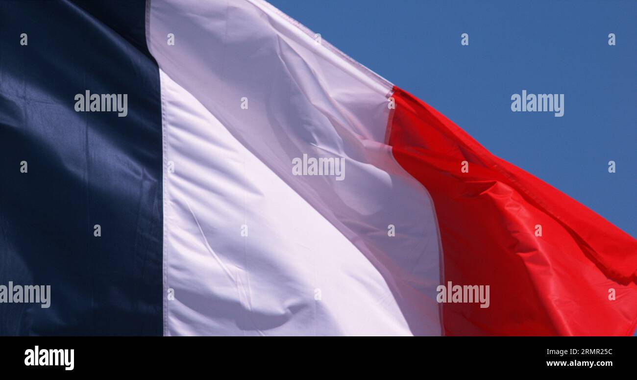French Flag Waving in the Wind Stock Photo - Alamy
