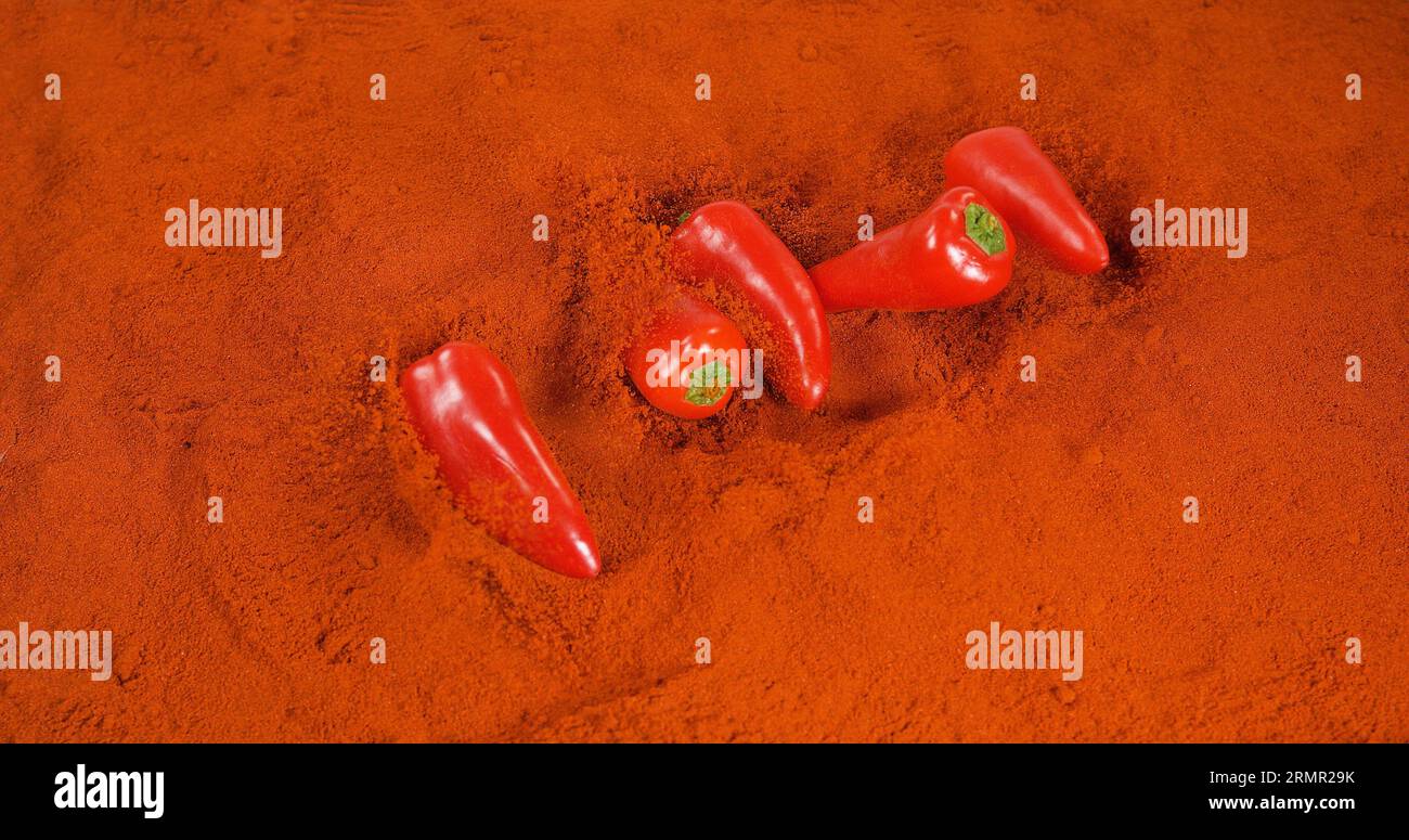 Paprika, capsicum annuum, falling on Paprika Powder Stock Photo - Alamy