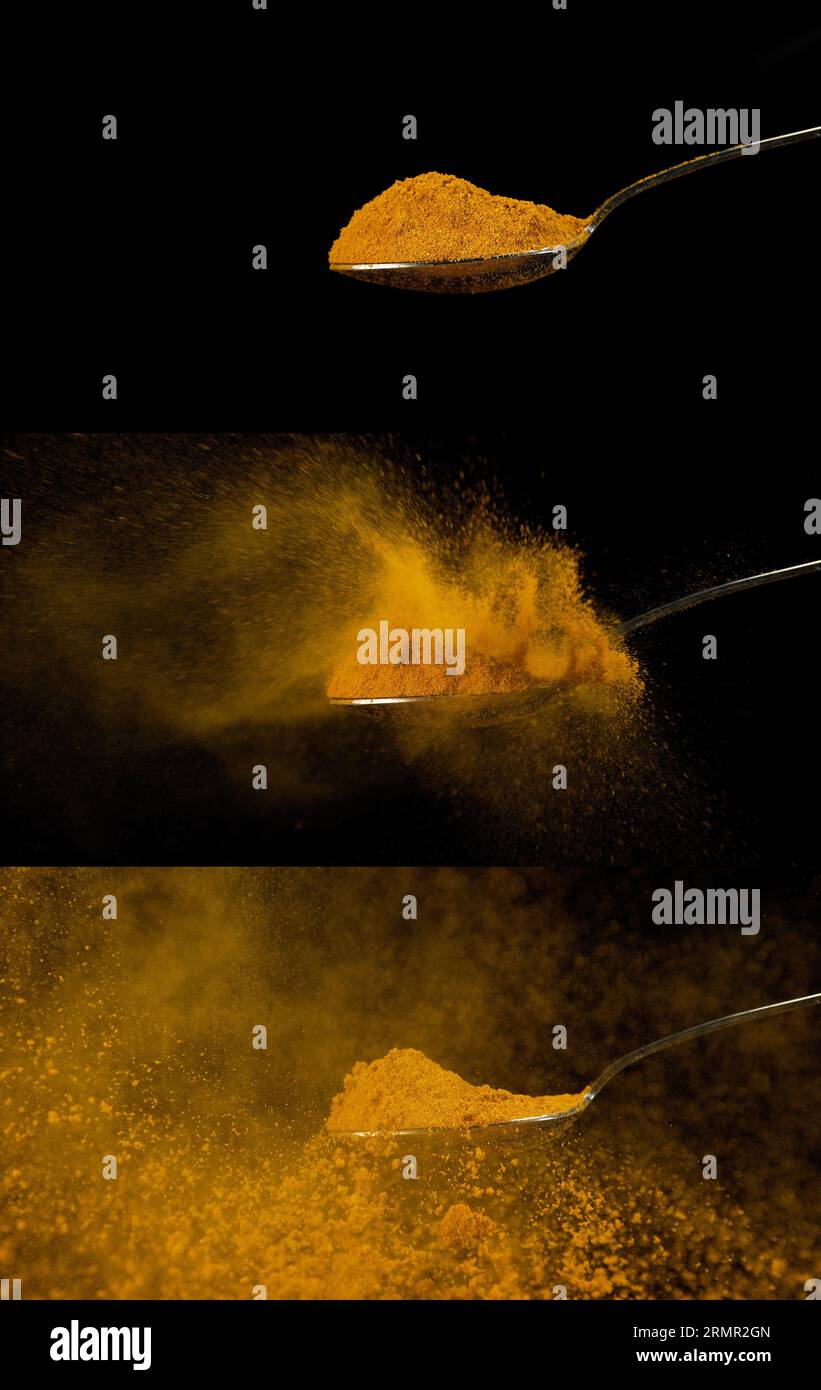 Spoon and Curry Powder falling from Spoon against Black Background ...