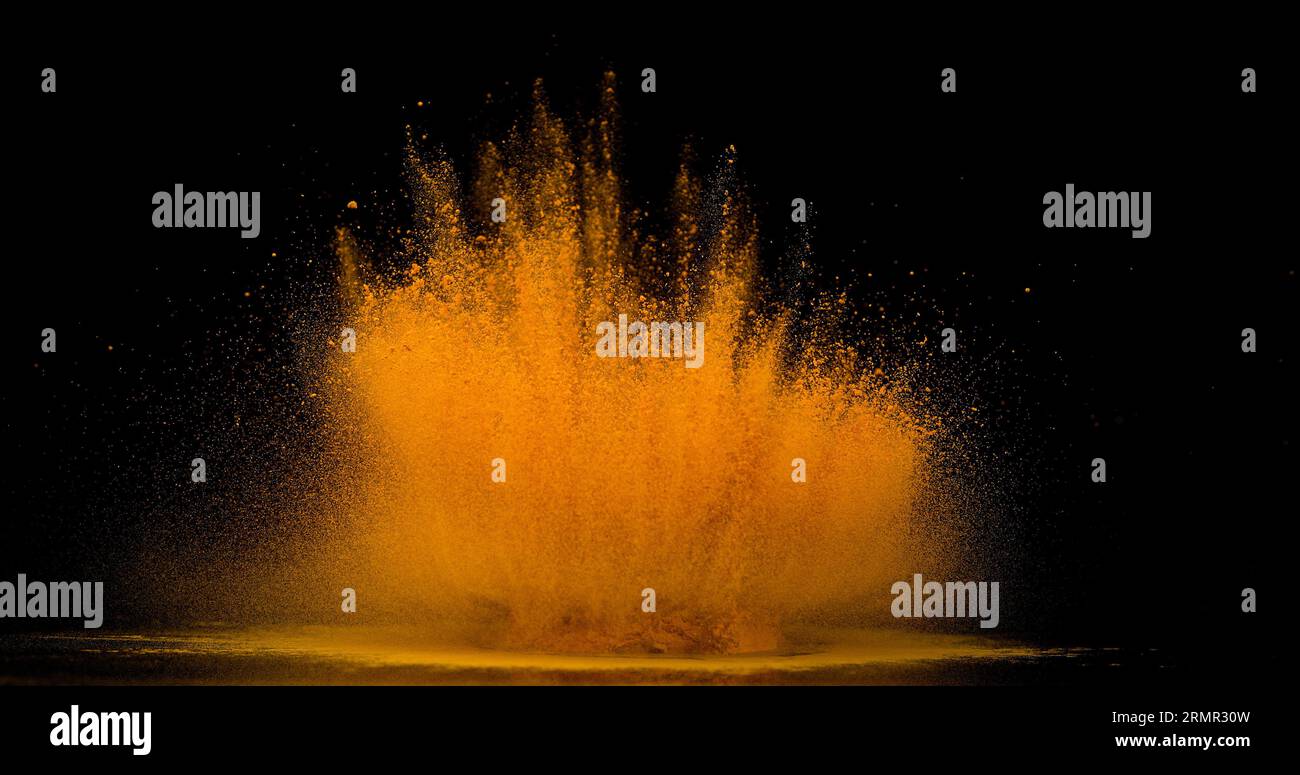 Turmeric, curcuma longa, Powder falling against Black Background ...