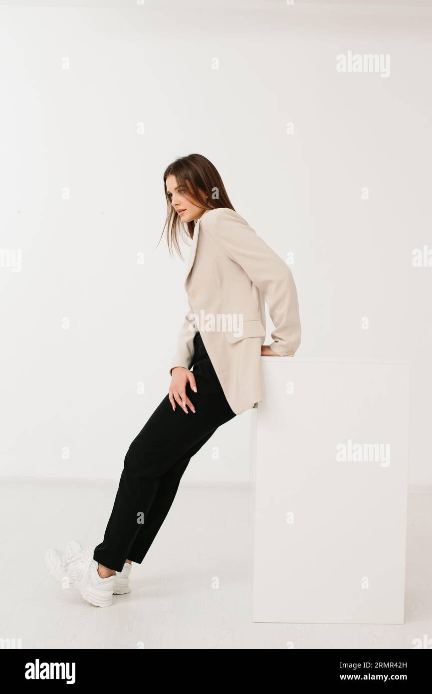 Studio Portrait Woman In Blazer Stock Photo - Alamy