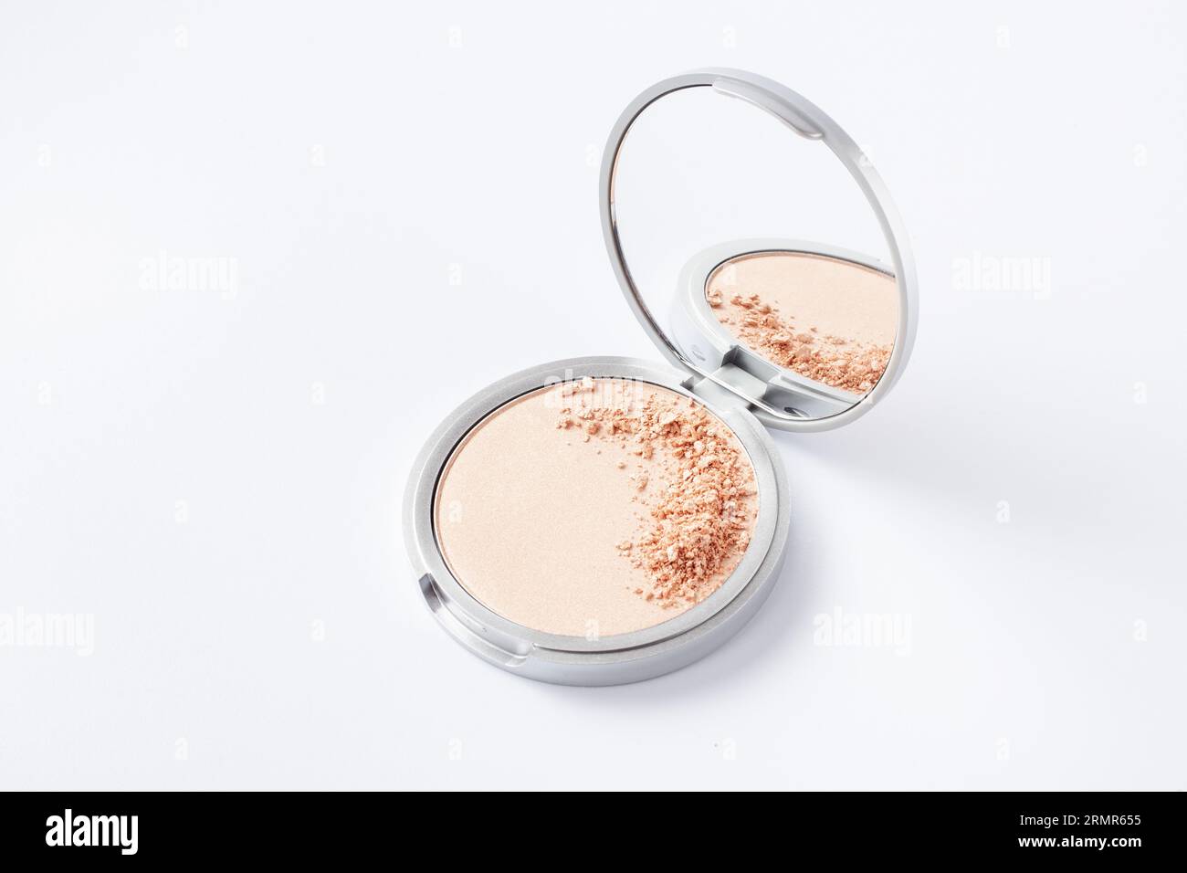 Beautiful eyeshadow palette on white with crushed sample. Makeup ...