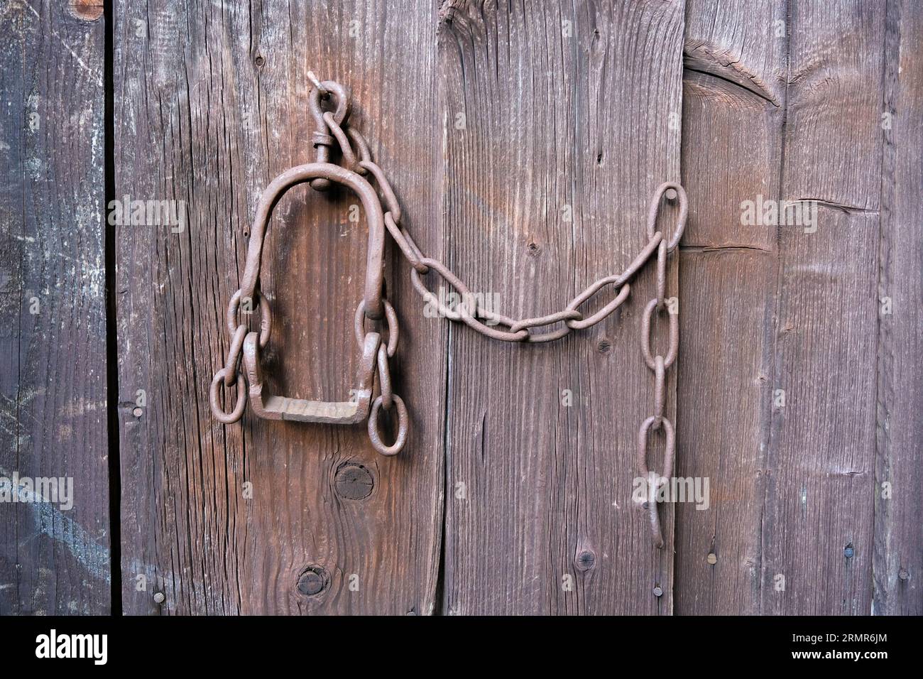 chain plow and wooden background Stock Photo - Alamy