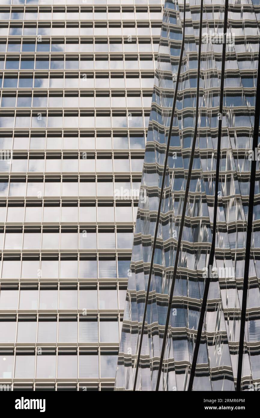 Reflections the windows of an office building in the City of LOndon ...
