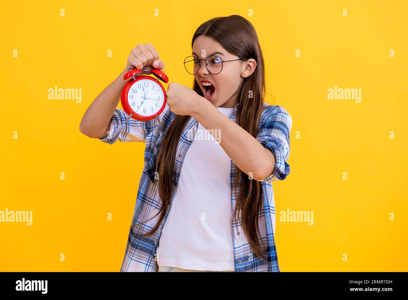 punctuality in early morning time. school time schedule. teen girl with ...