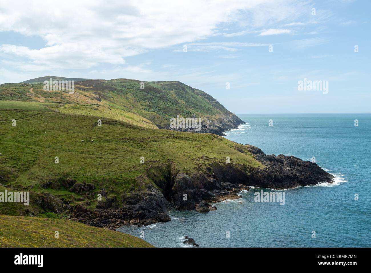 The Wales Coast Path with the hill mynydd mawr on the North coast of ...