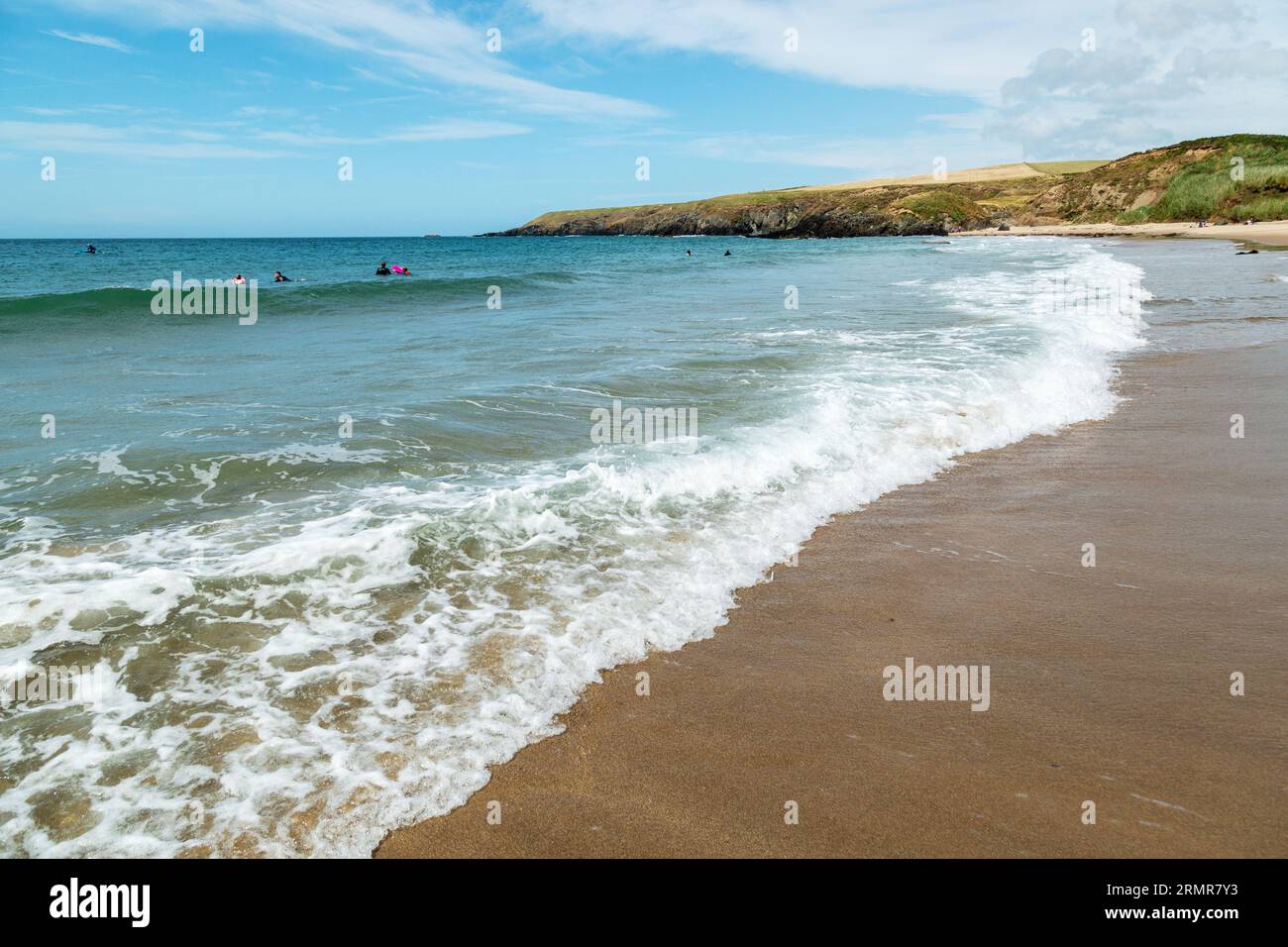 Holidaymakers enjoying sunny weather on Traeth Porthor beach, llyn ...