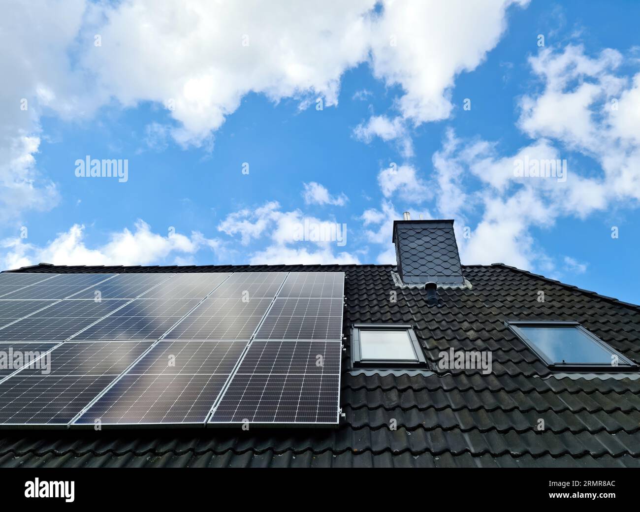 Solar Panels Producing Clean Energy On A Roof Of A Residential House ...