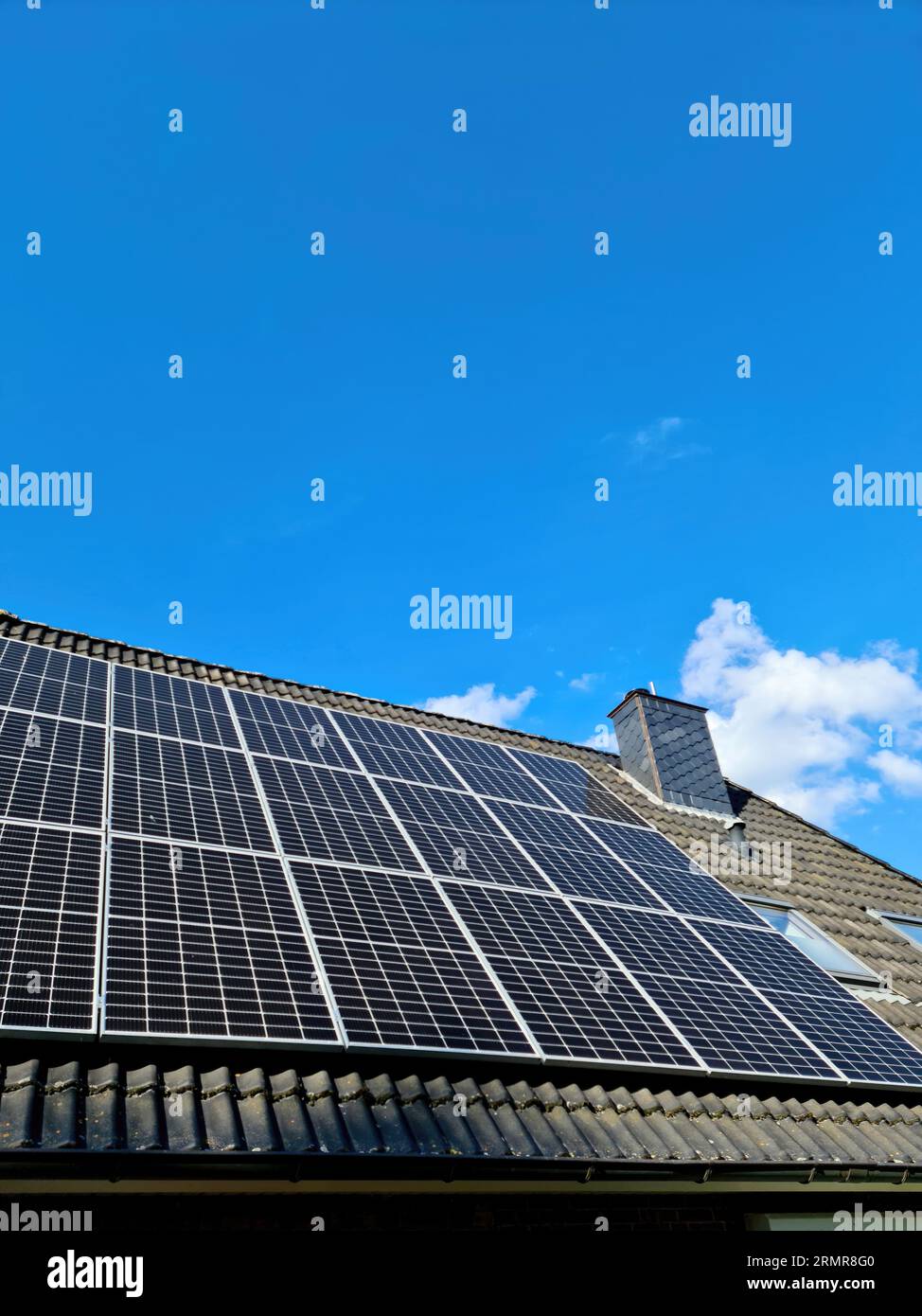 Solar Panels Producing Clean Energy On A Roof Of A Residential House ...