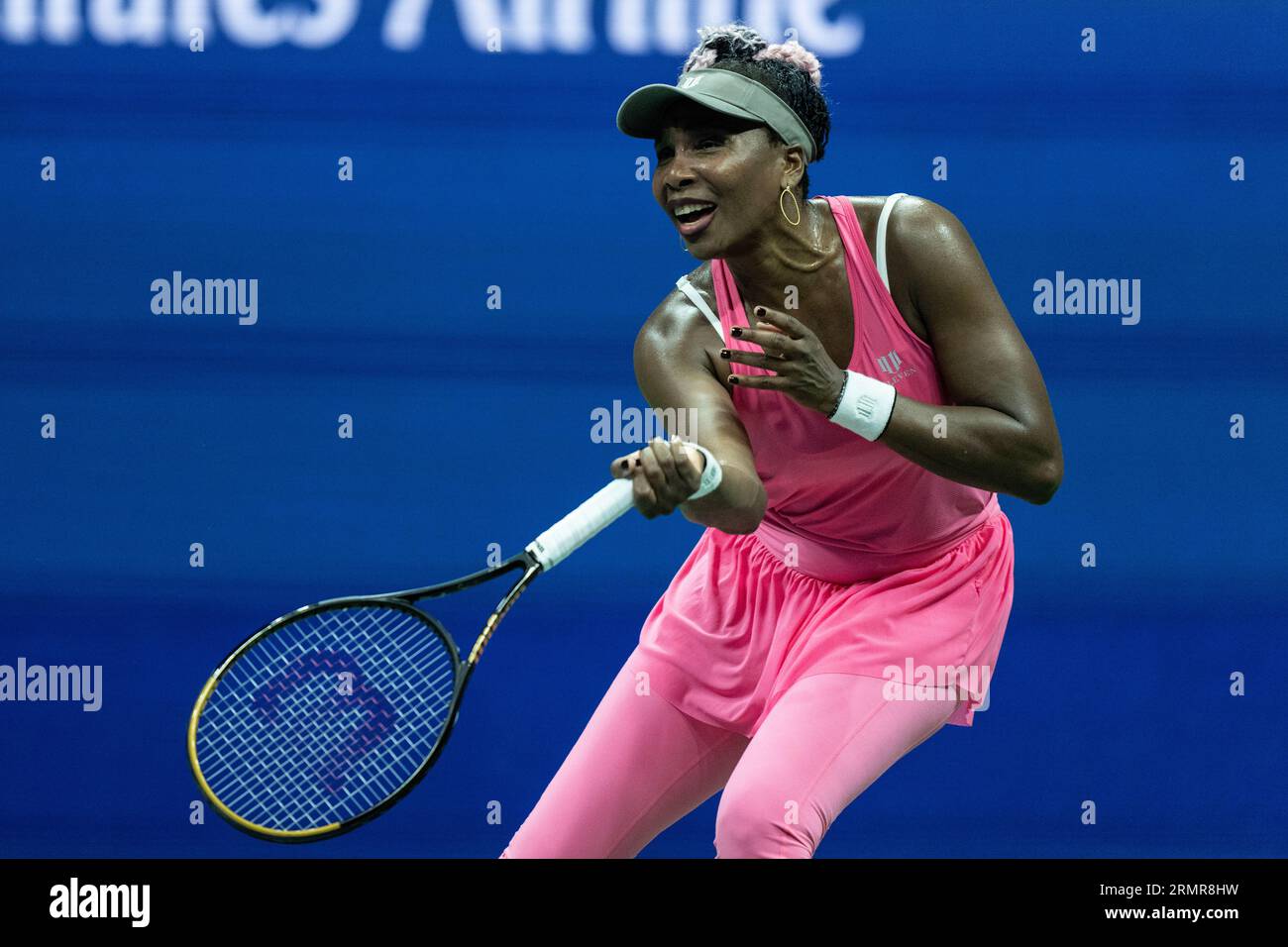 Venus Williams of USA in action during 1st round against Greet Minnen ...