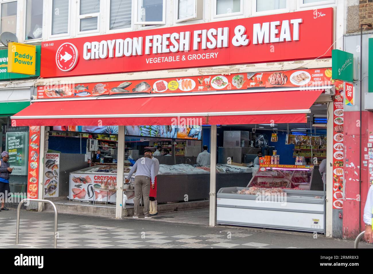 CROYDON, LONDON- AUGUST 29, 2023: Croydon fish and meat shop on town ...