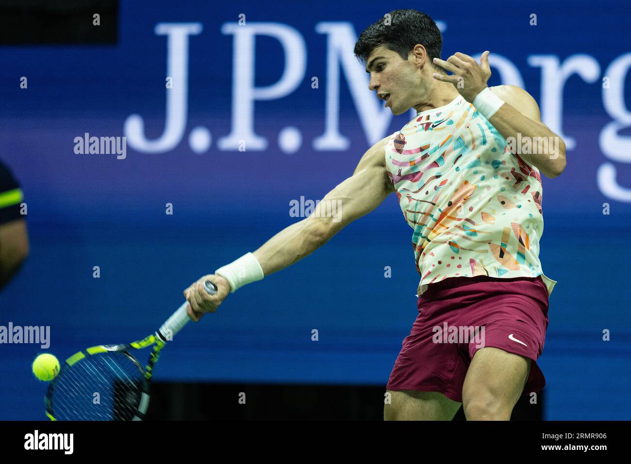 Carlos Alcaraz of Spain returns ball during 1st round match against ...