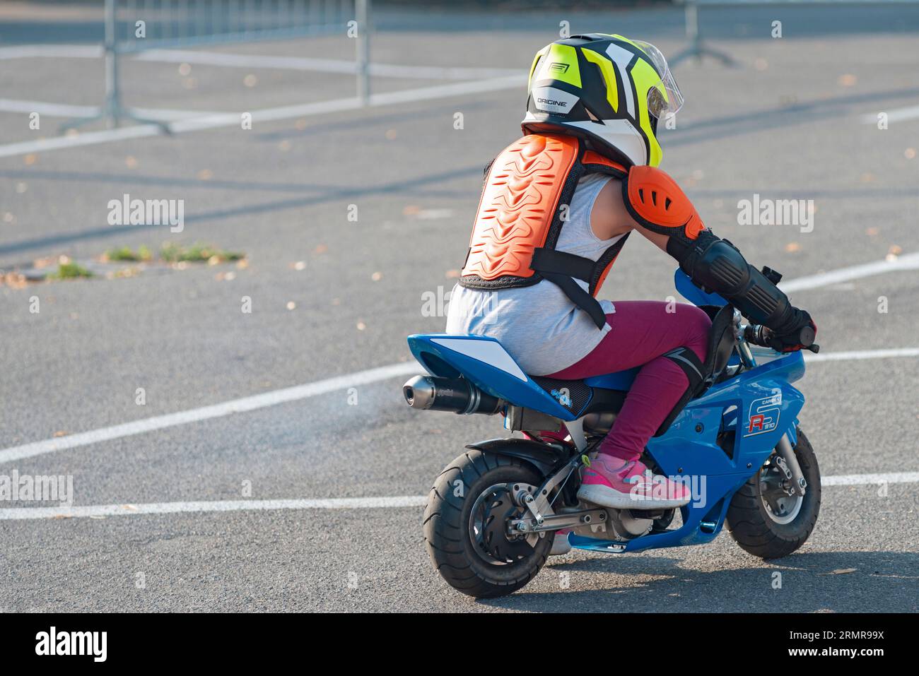 Girl Riding a Mini Moto Stock Photo - Alamy