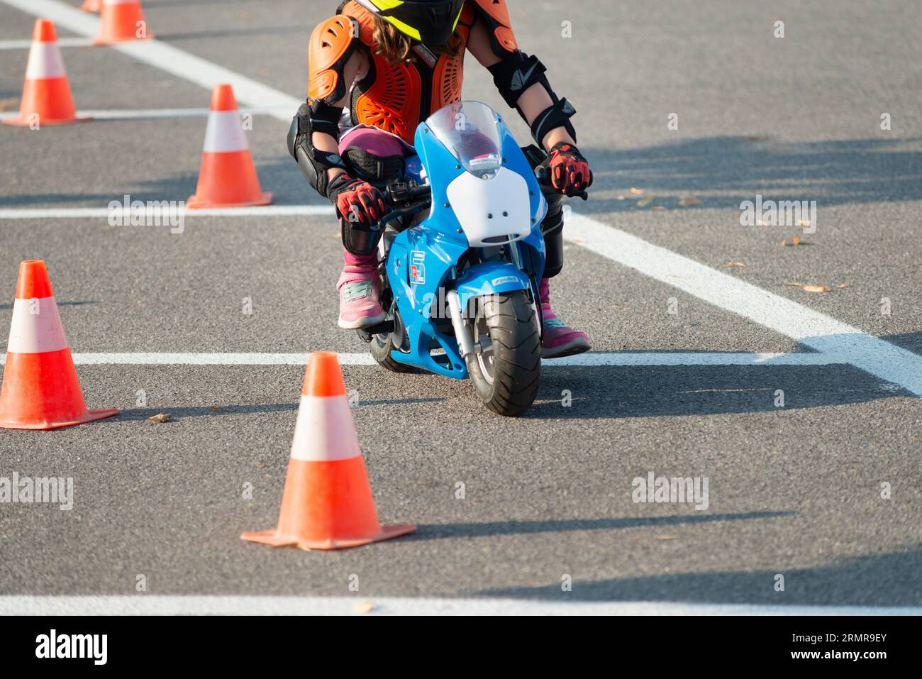 Girl Riding a Mini Moto Stock Photo - Alamy