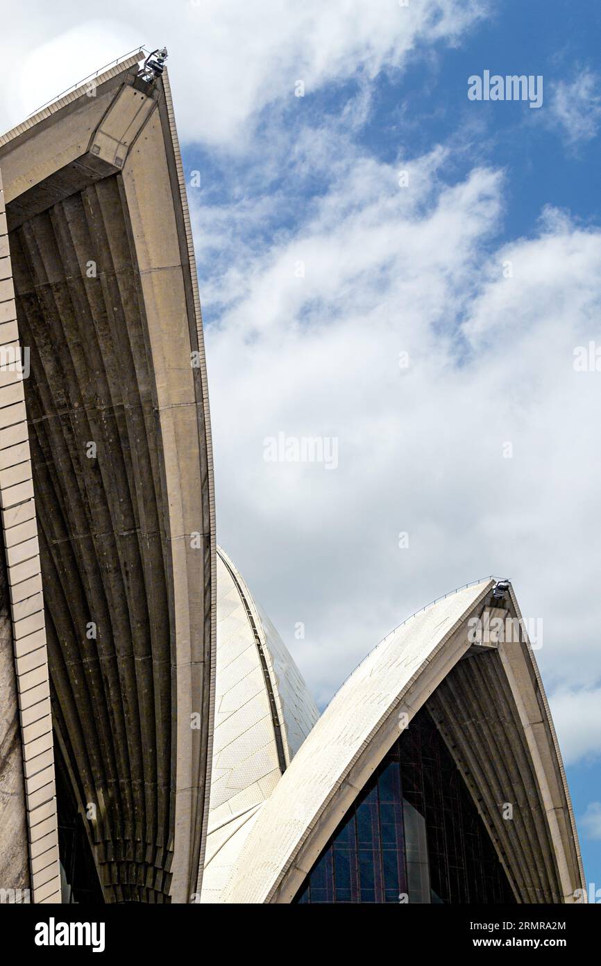 Close up of the arches of the Sydney Opera House, under blue skies on a ...