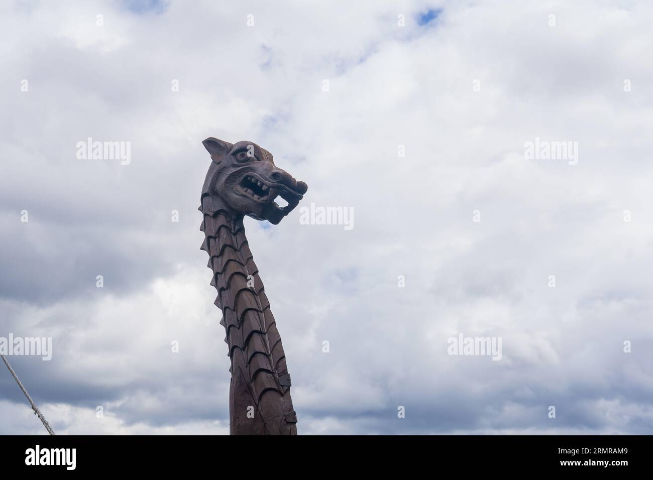 figurehead on the bow of a full-scale replica of a viking ship, against ...