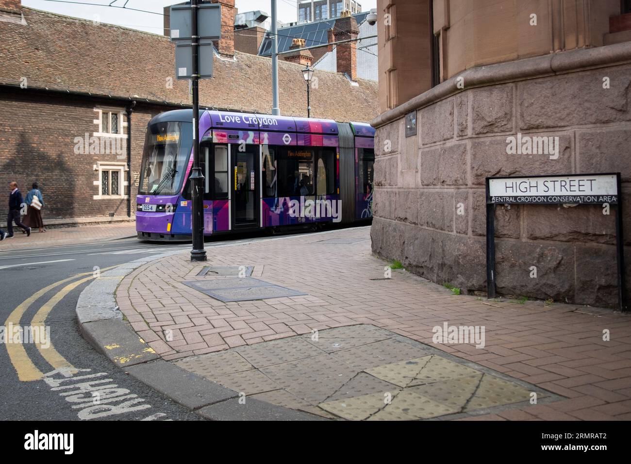 CROYDON, LONDON- AUGUST 29, 2023: High Street street signn and tram in ...