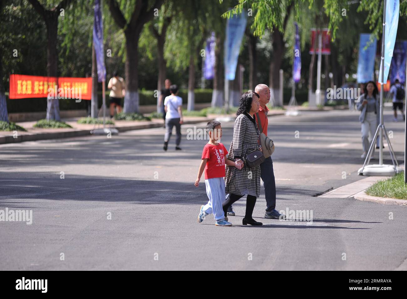 People visit the campus of the Harbin Institute of Technology in Harbin ...