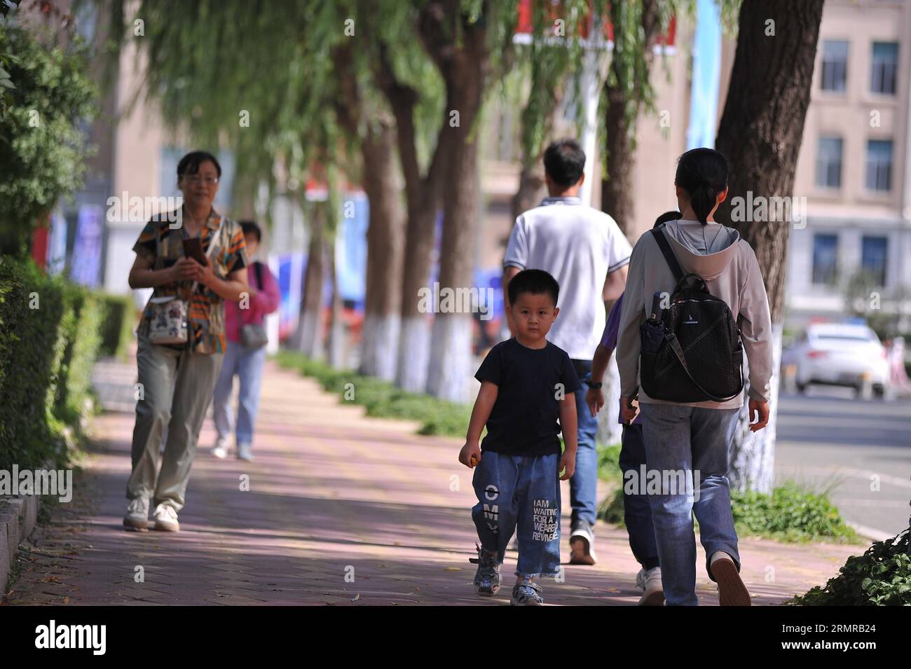People visit the campus of the Harbin Institute of Technology in Harbin ...