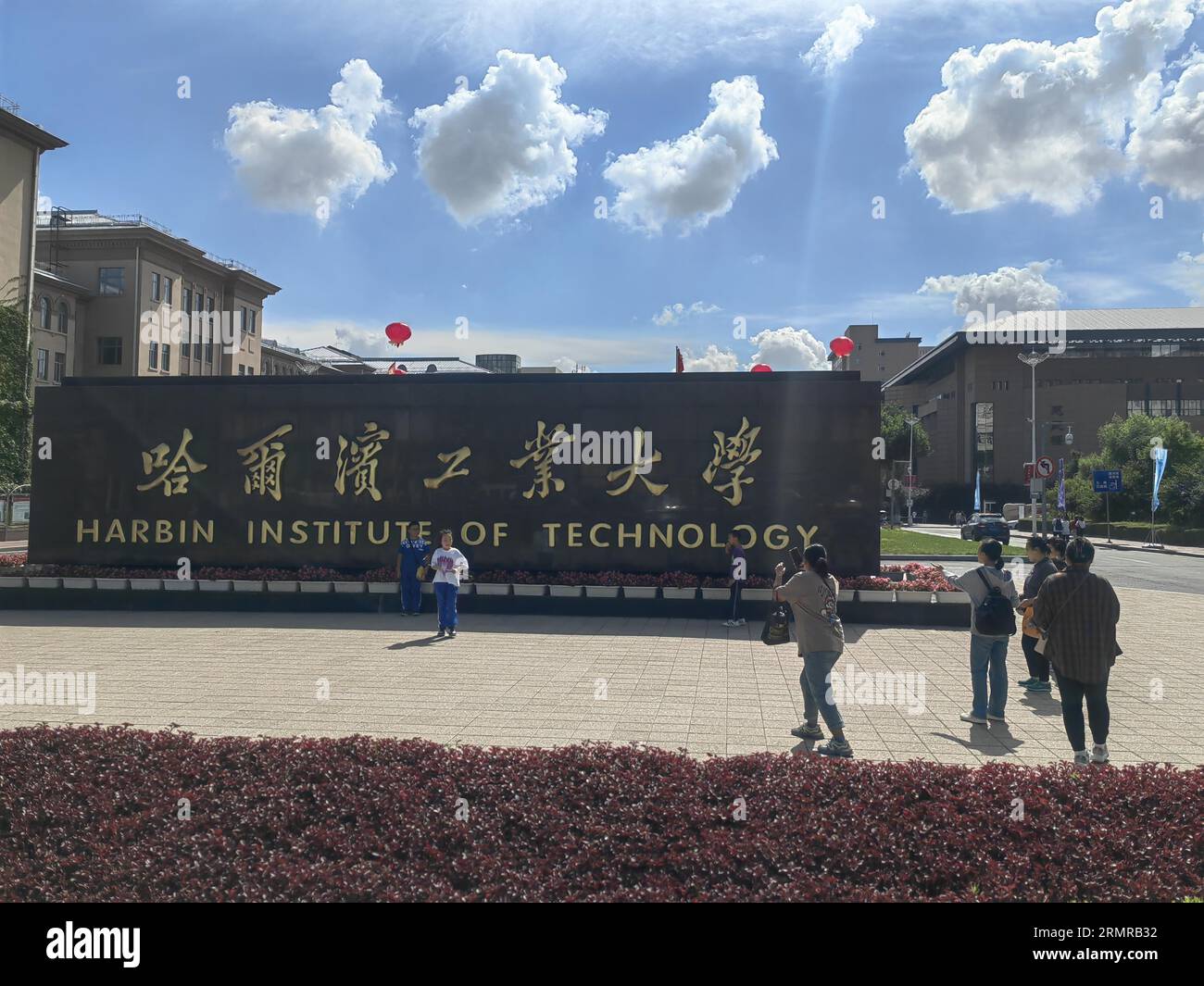 People visit the campus of the Harbin Institute of Technology in Harbin City, northeast China's ...