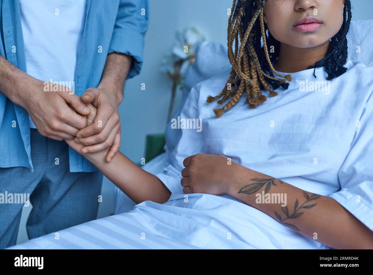 Miscarriage Concept Man Holding Hand Of Depressed African American