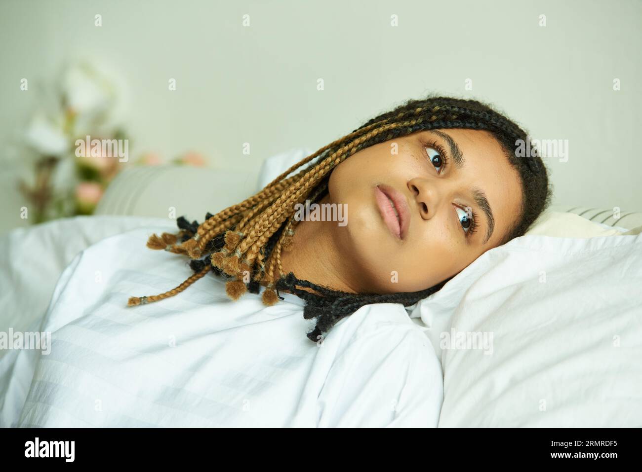 grief, depressed african american woman lying in private ward, hospital ...