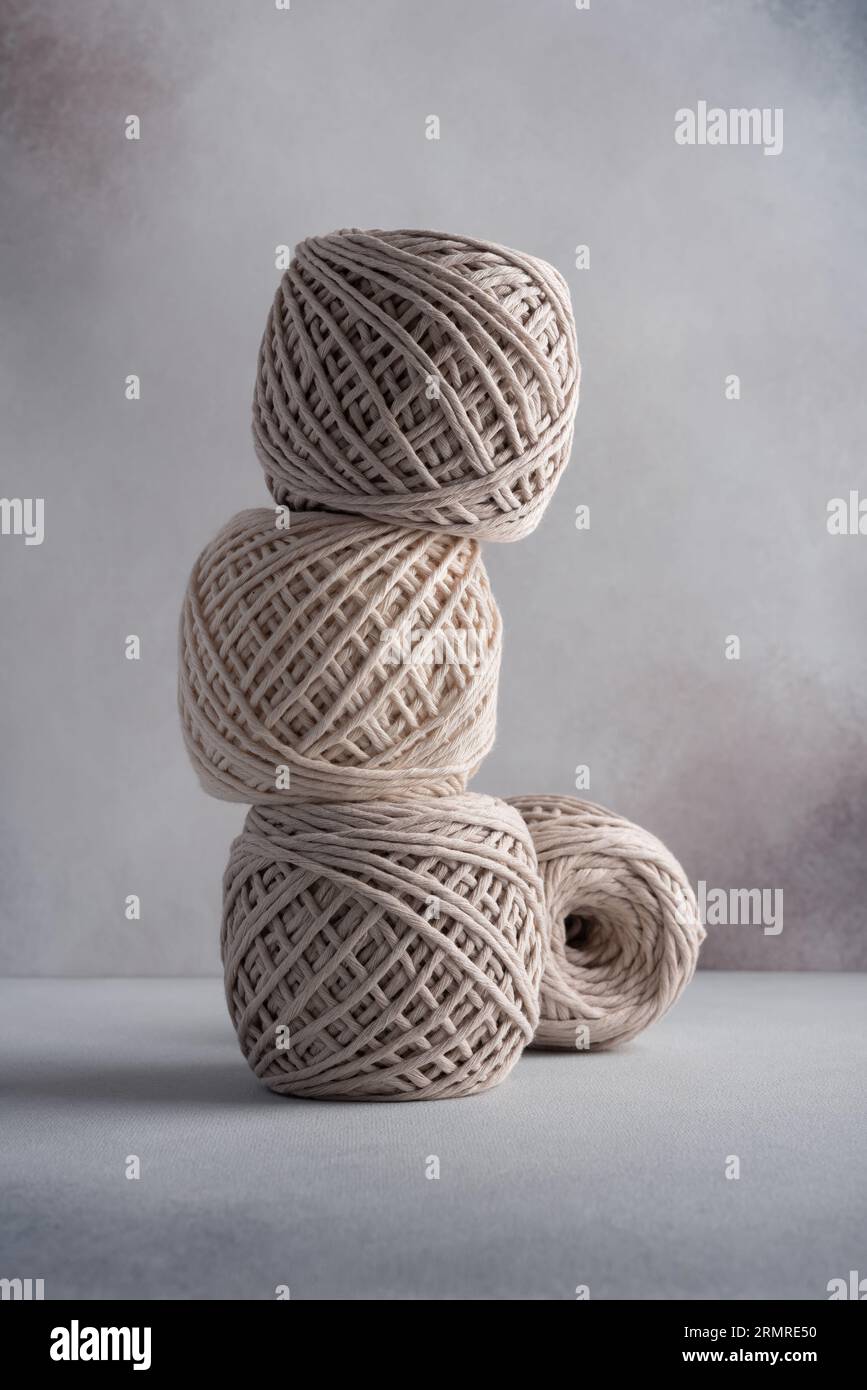 Stack of cotton threads pastel color skeins for craft and handmade on a ...