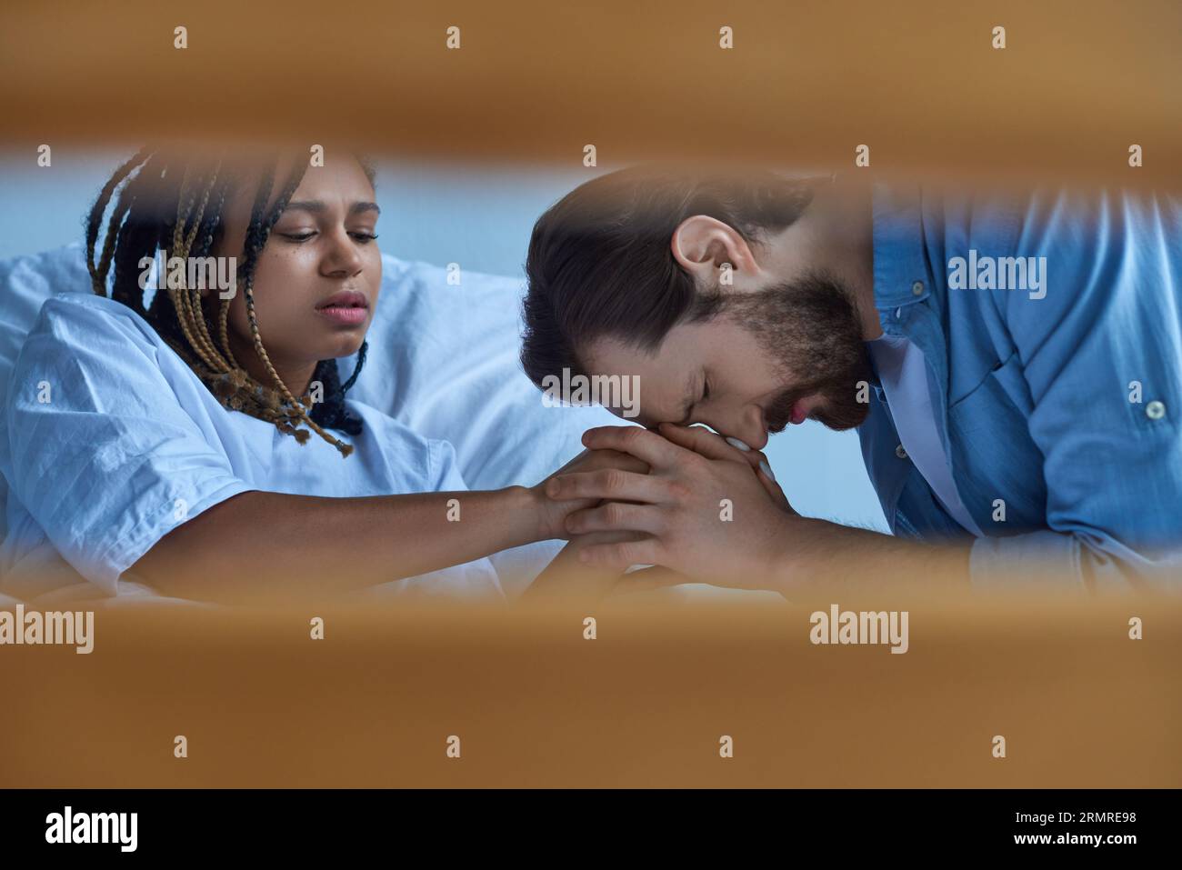 miscarriage concept, african american woman holding hand of grieving ...
