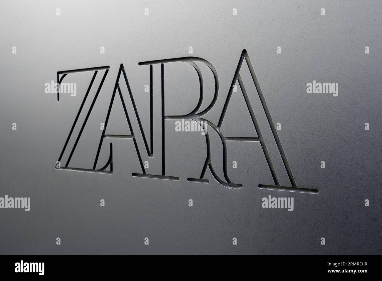 Coruna, Spain; august 29, 2023: Close up of a Zara sign logo on facade ...