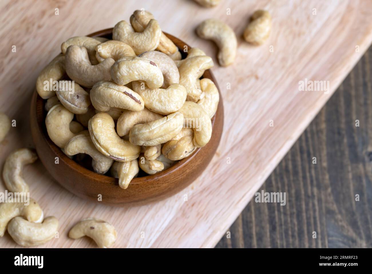 fresh cashew nuts on the table, scattered pile of cashew nuts Stock ...