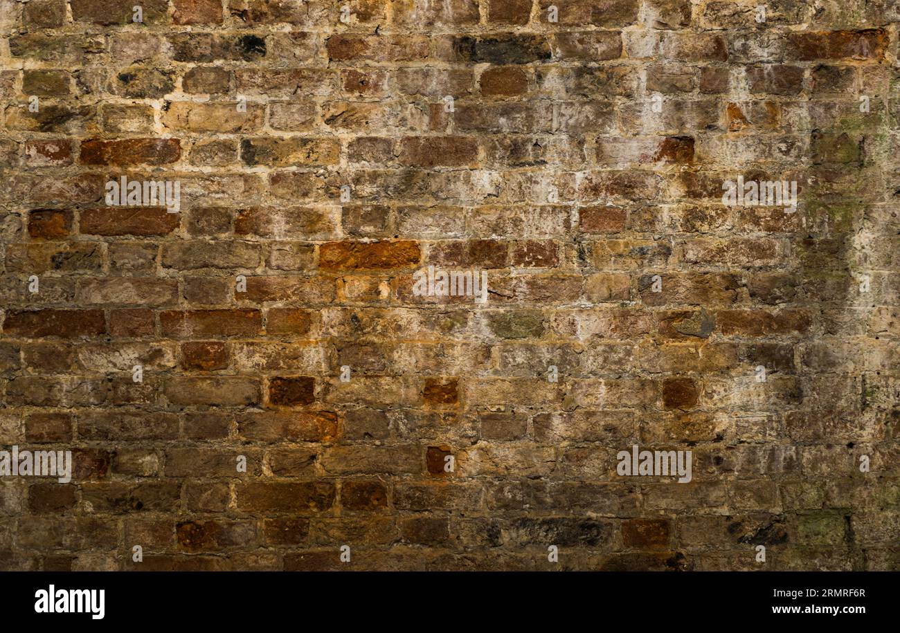 Texture of an old brick wall in a warm and very textured tone Stock ...