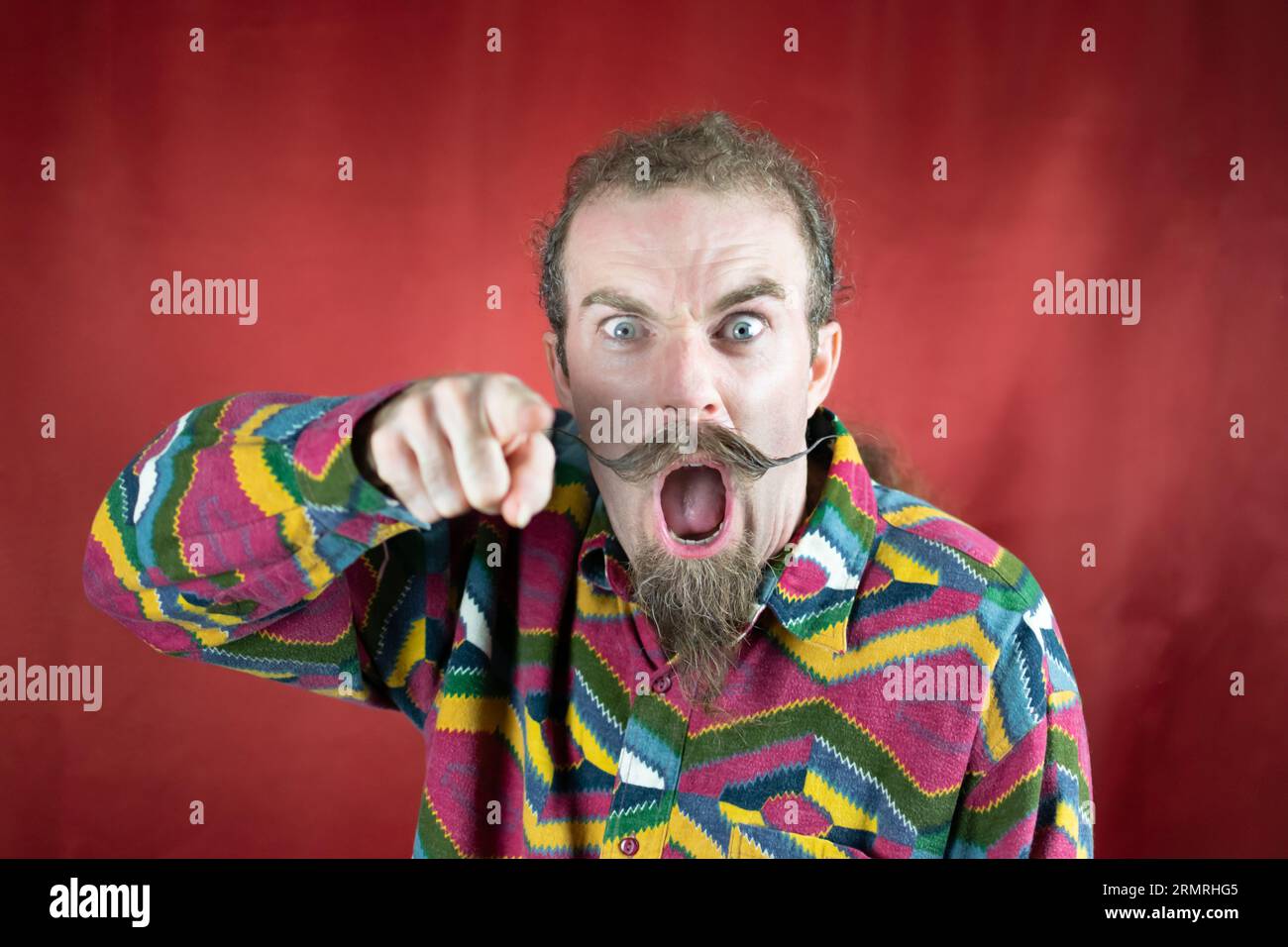 Angry man shouting pointing finger hi-res stock photography and images ...