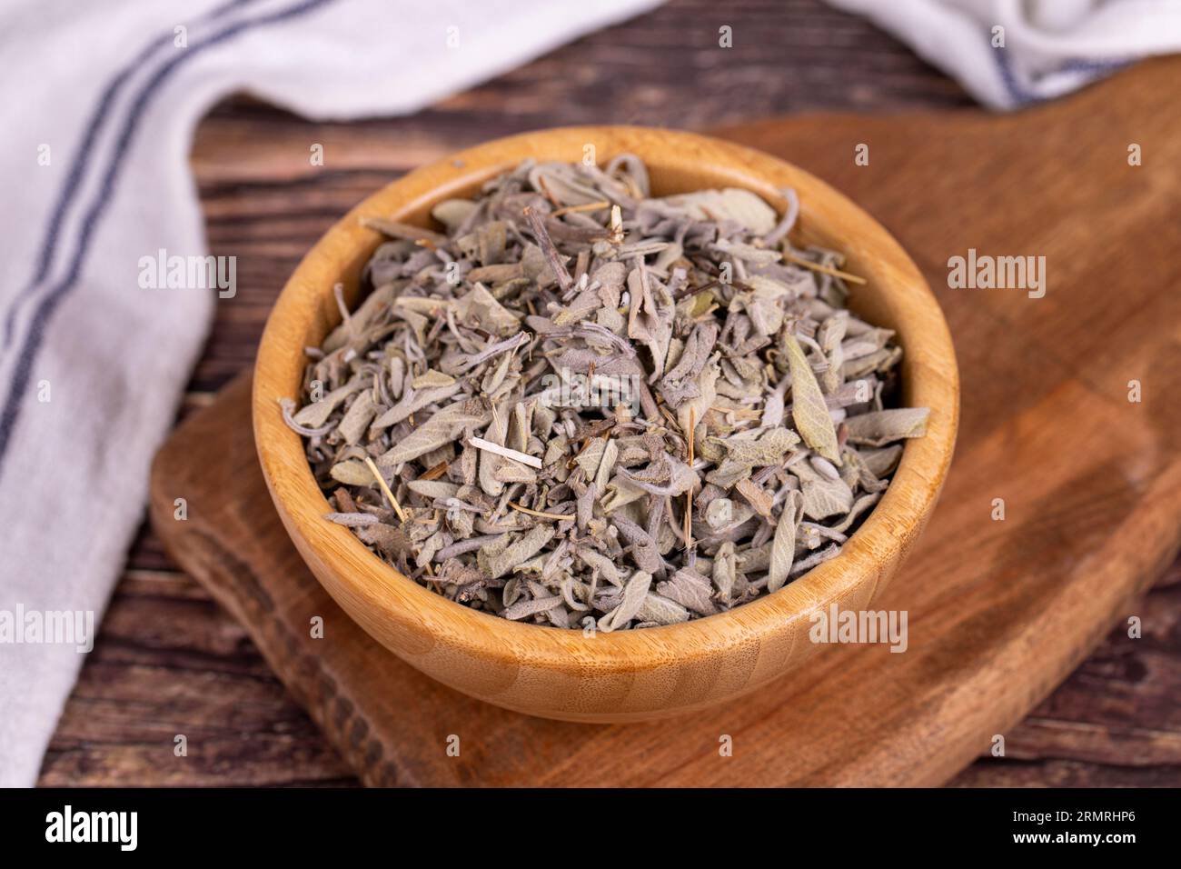 Dry Sage leaves. Dried salvia or sage leaves in wood bowl. herbal medicine. Close up Stock Photo ...