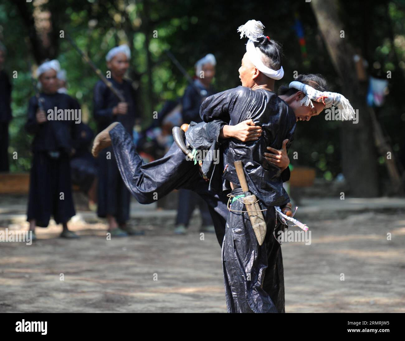 Two people carry guns hi-res stock photography and images - Alamy