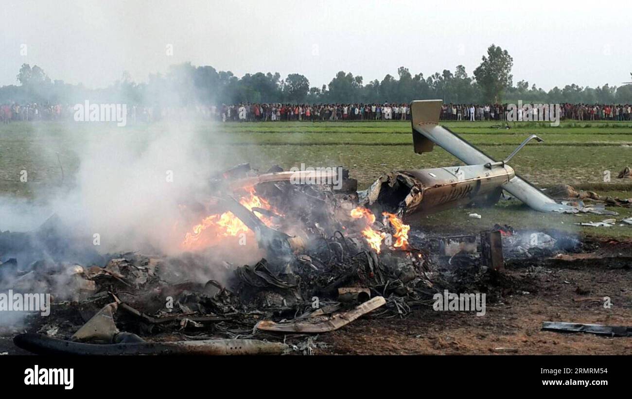 An Indian Air Force helicopter is engulfed in fire as it crashed in ...