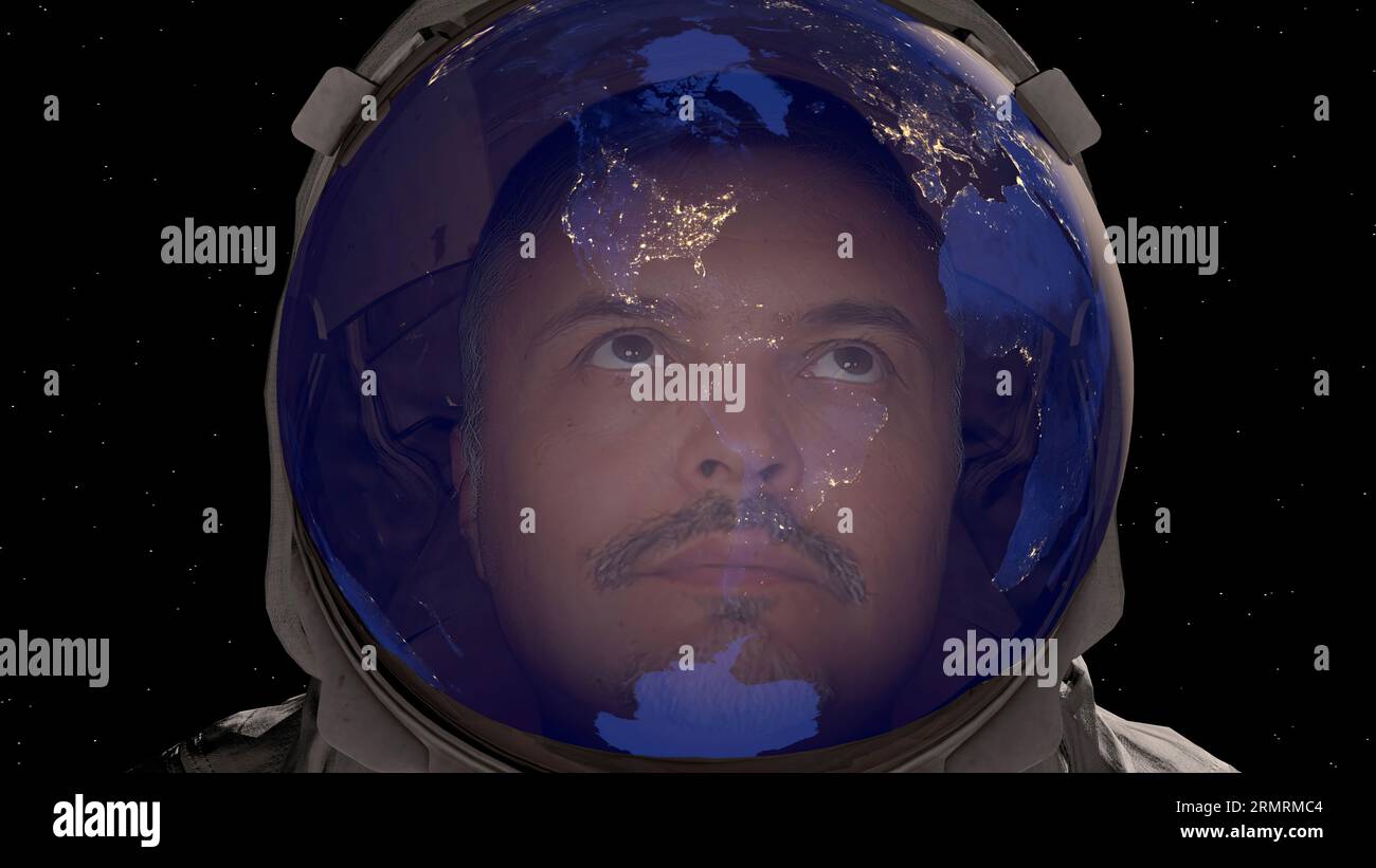 Portrait of man astronaut in outer space wearing helmet looking at ...