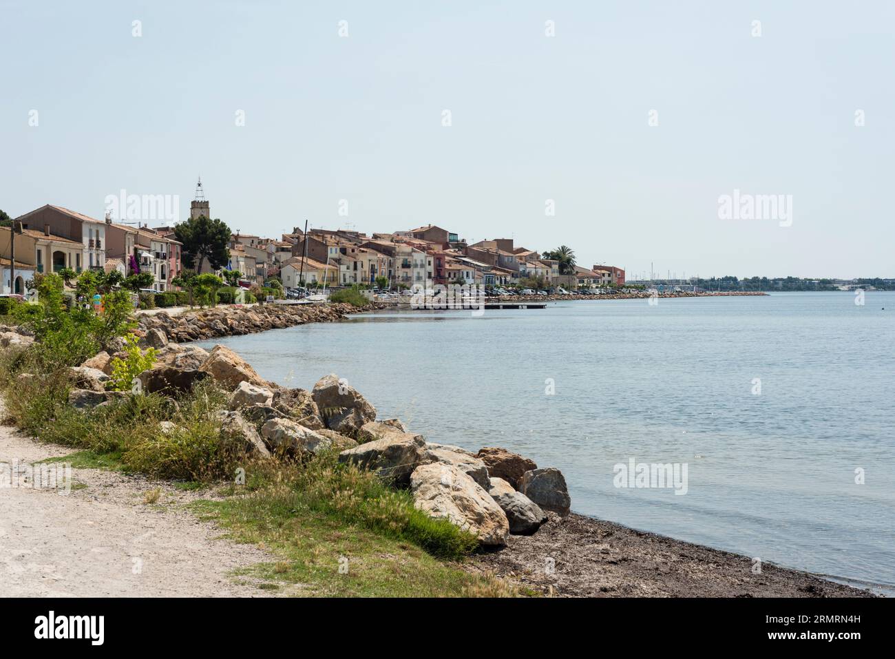 View of village and Etang de Thau, Bouzigues, Herault, Occitanie ...