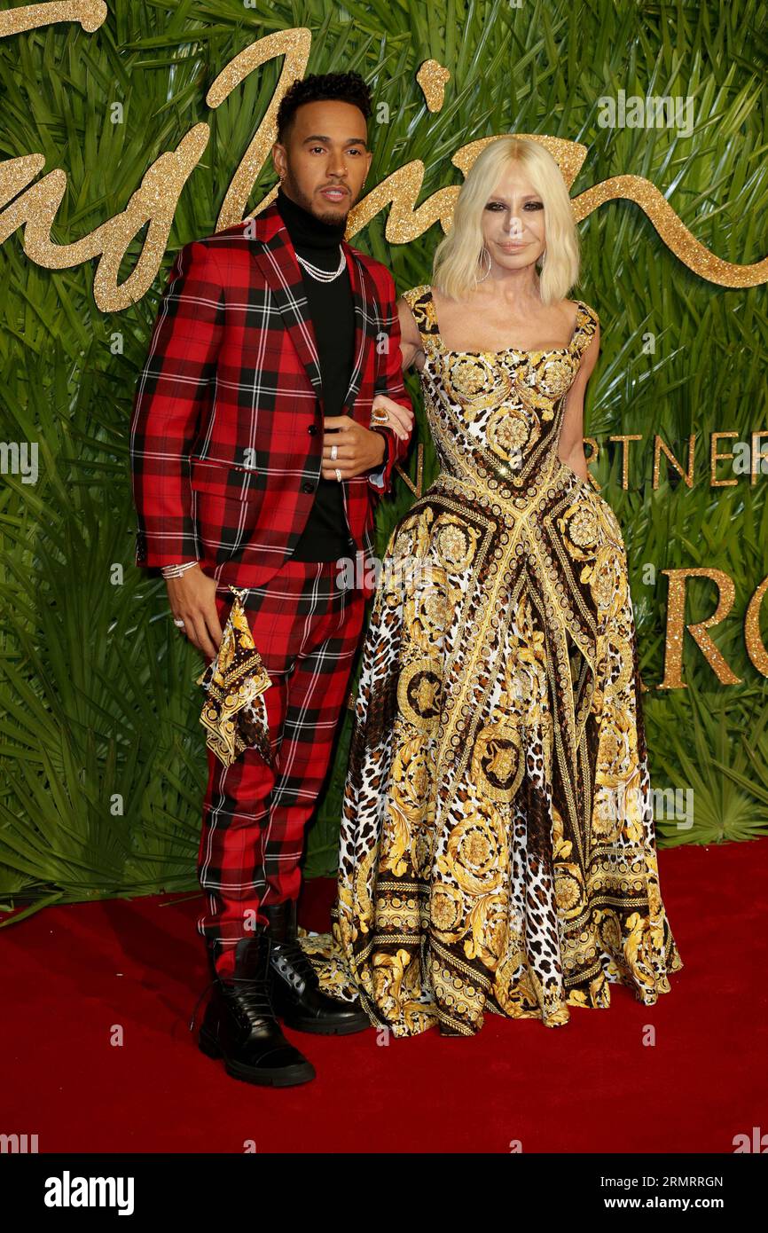 Lewis Hamilton and Donatella Versace attend The Fashion Awards 2017 at ...