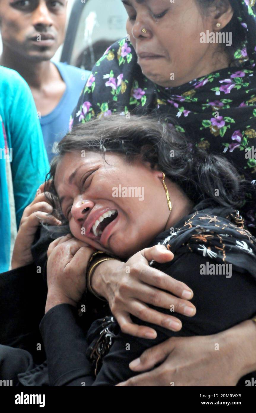 (140805) -- MAWA, Aug. 5, 2014 -- Bangladeshi people mourn for their missing relatives as the ...