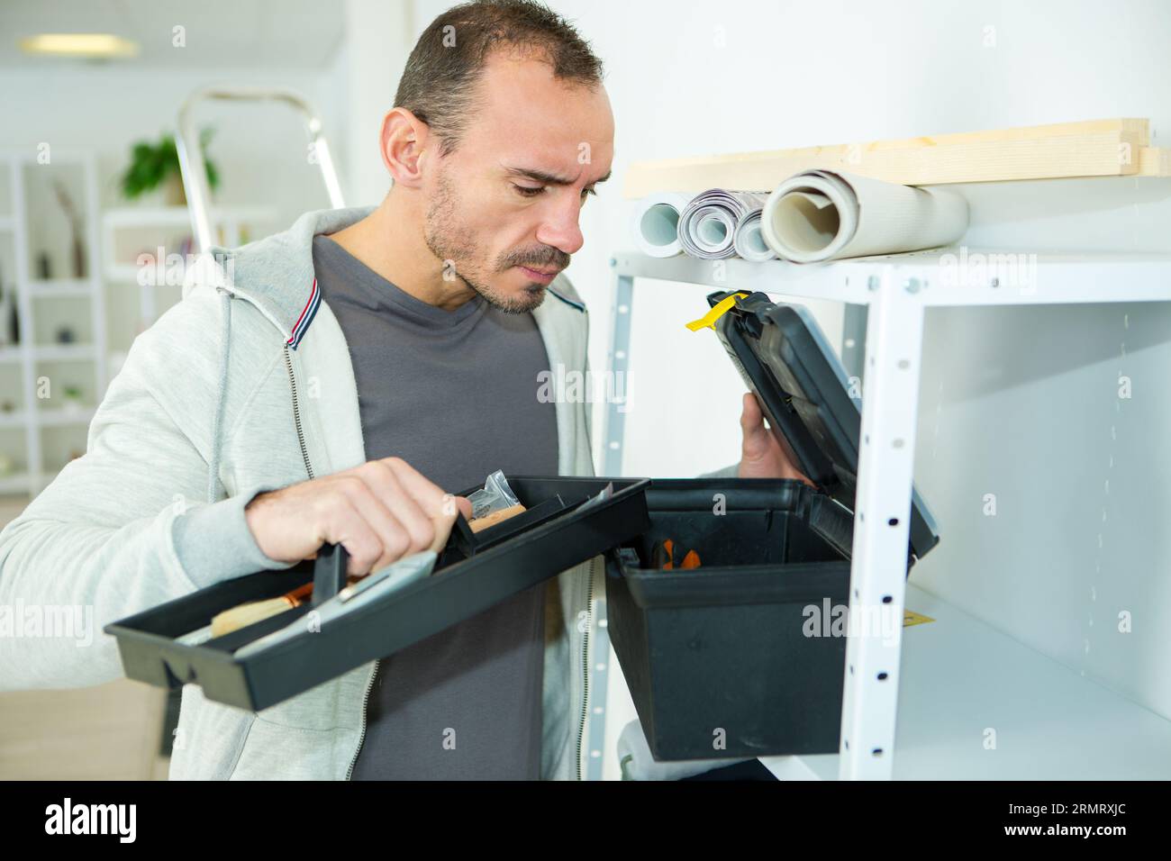 Man white hardhat toolbox hi-res stock photography and images - Alamy