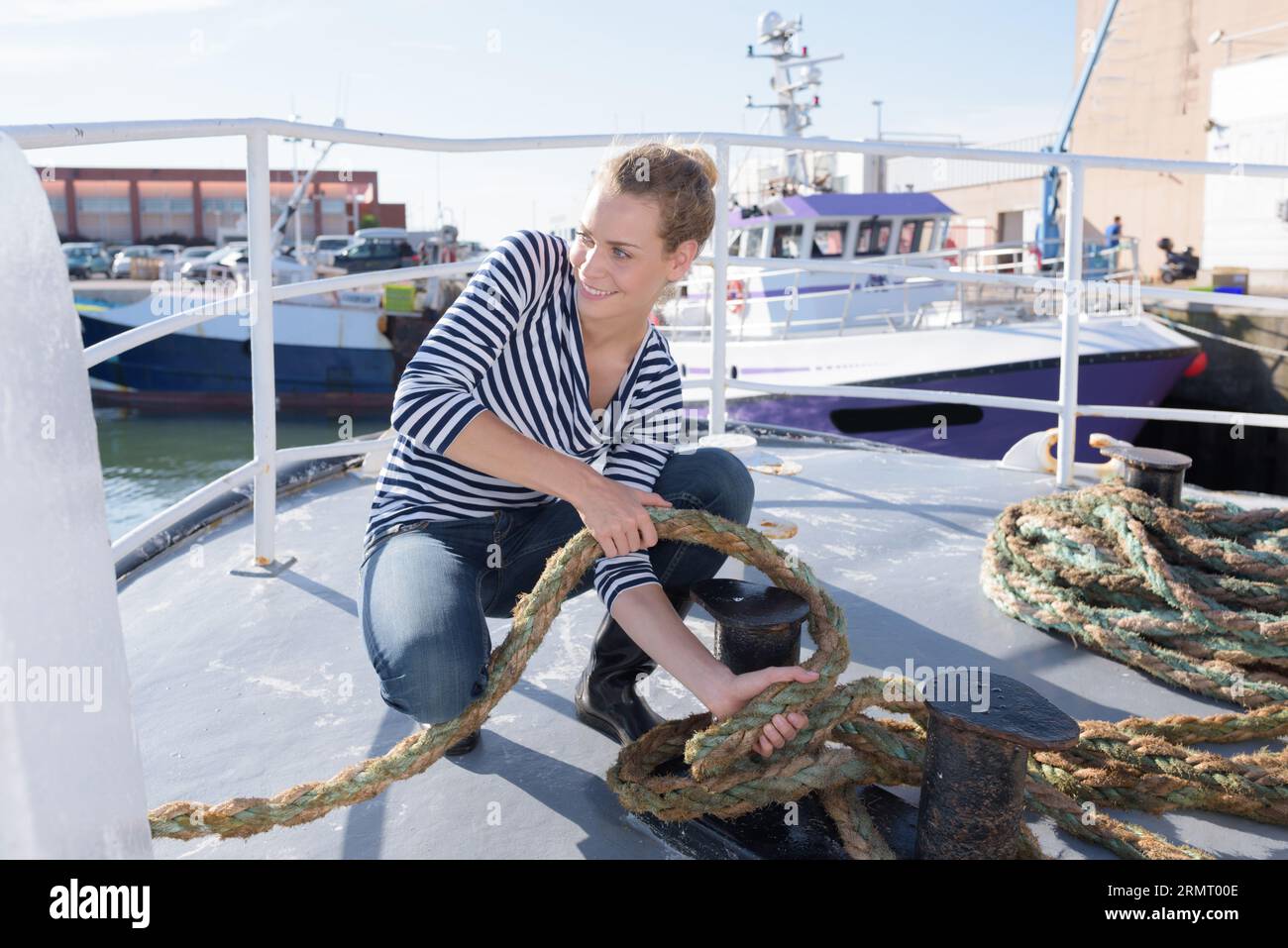 Yacht crew working hi-res stock photography and images - Alamy