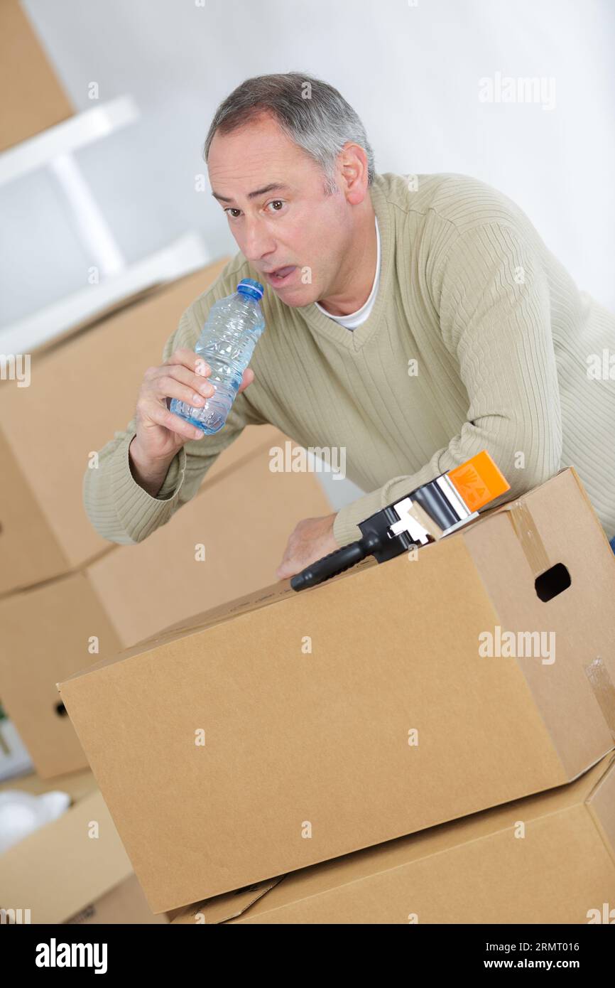 Moving a water tank hi-res stock photography and images - Alamy